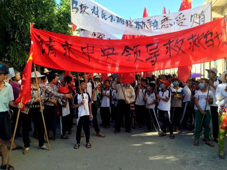 China's one-time 'democracy' village protests for fourth...