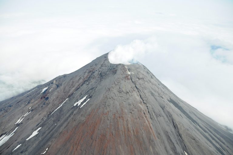 Alert level raised for Alaska volcano after explosion detected