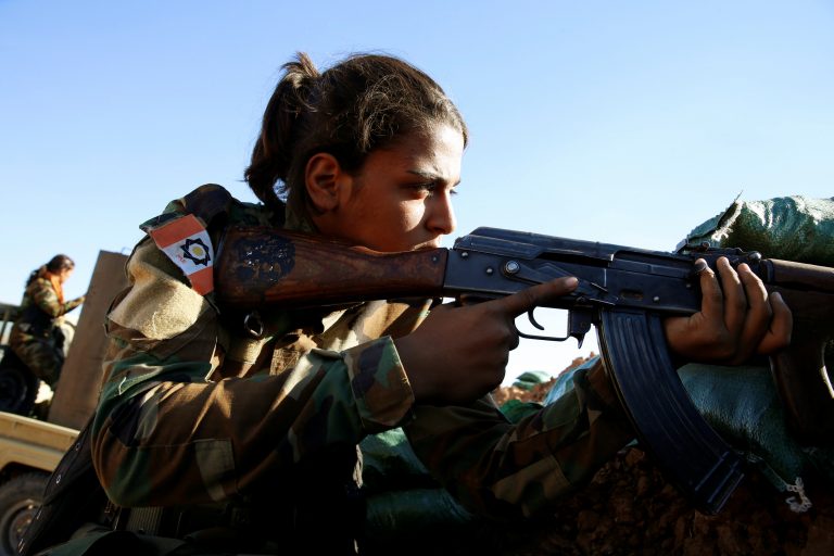 Kurdish women fighters battle Islamic State with machineguns and songs