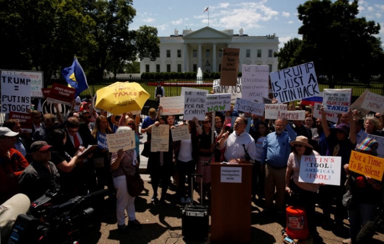 Protesters call for investigation following FBI director firing