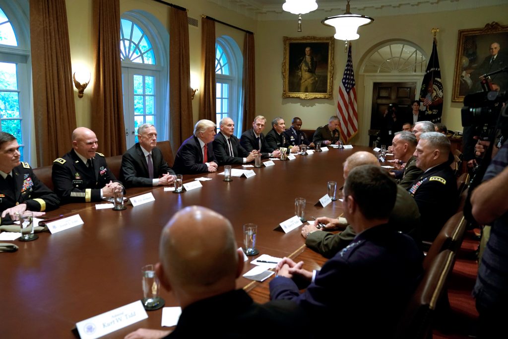 In meeting with military, Trump talks of 'calm before the storm'