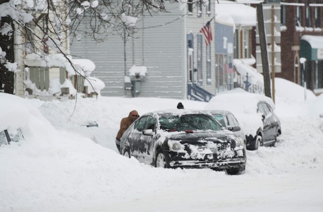 Erie, Pennsylvania, buried under record snowfall, " a crippling snow event"