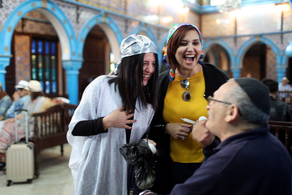 Jews and Muslims celebrate unusual coexistence in Tunisia's Djerba