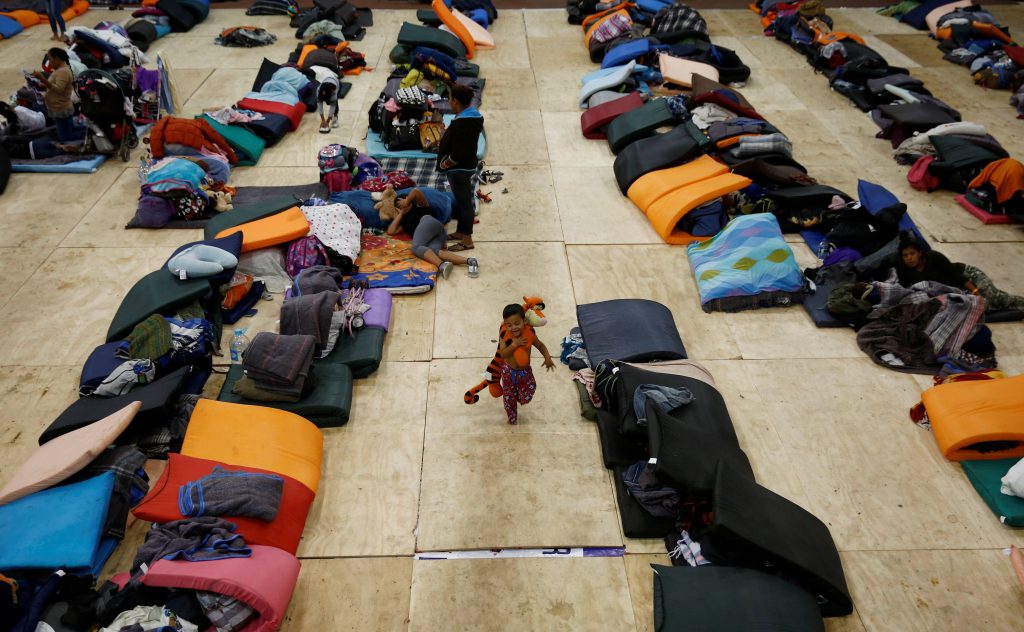 Tensions rise at U.S.-Mexico border as migrants, holiday travelers wait ...